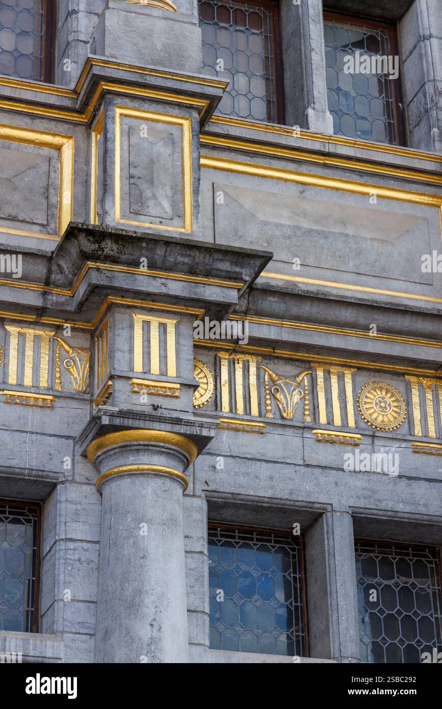 Detail of gold ornamentation on building in the Grand Place, Tournai ...