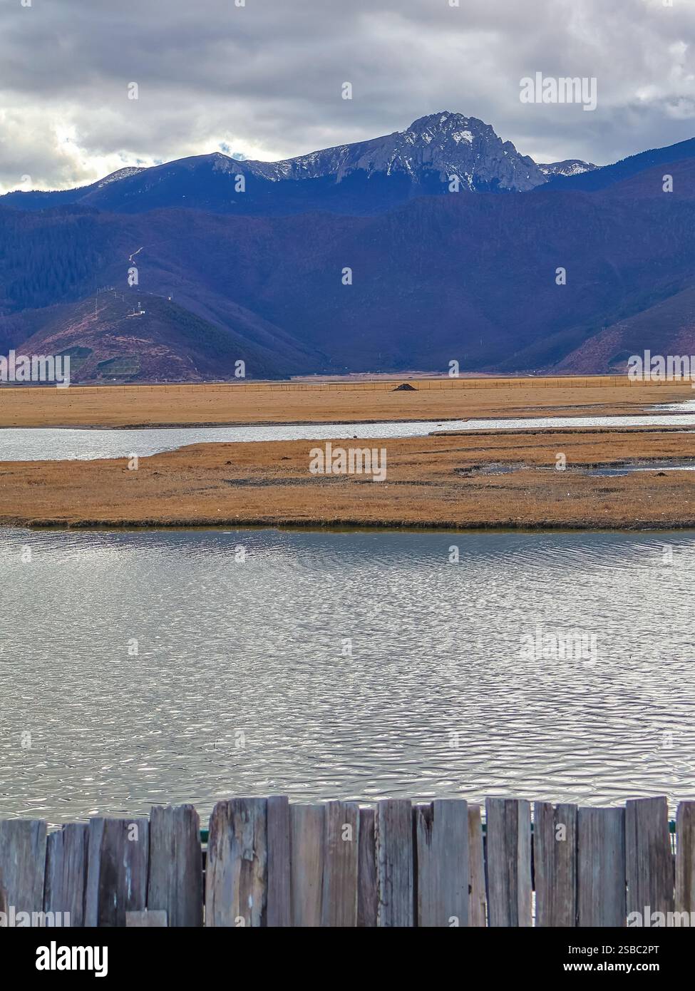 Napahai Grassland Scenic Area And Napahai Lake Surrounded by Snow ...
