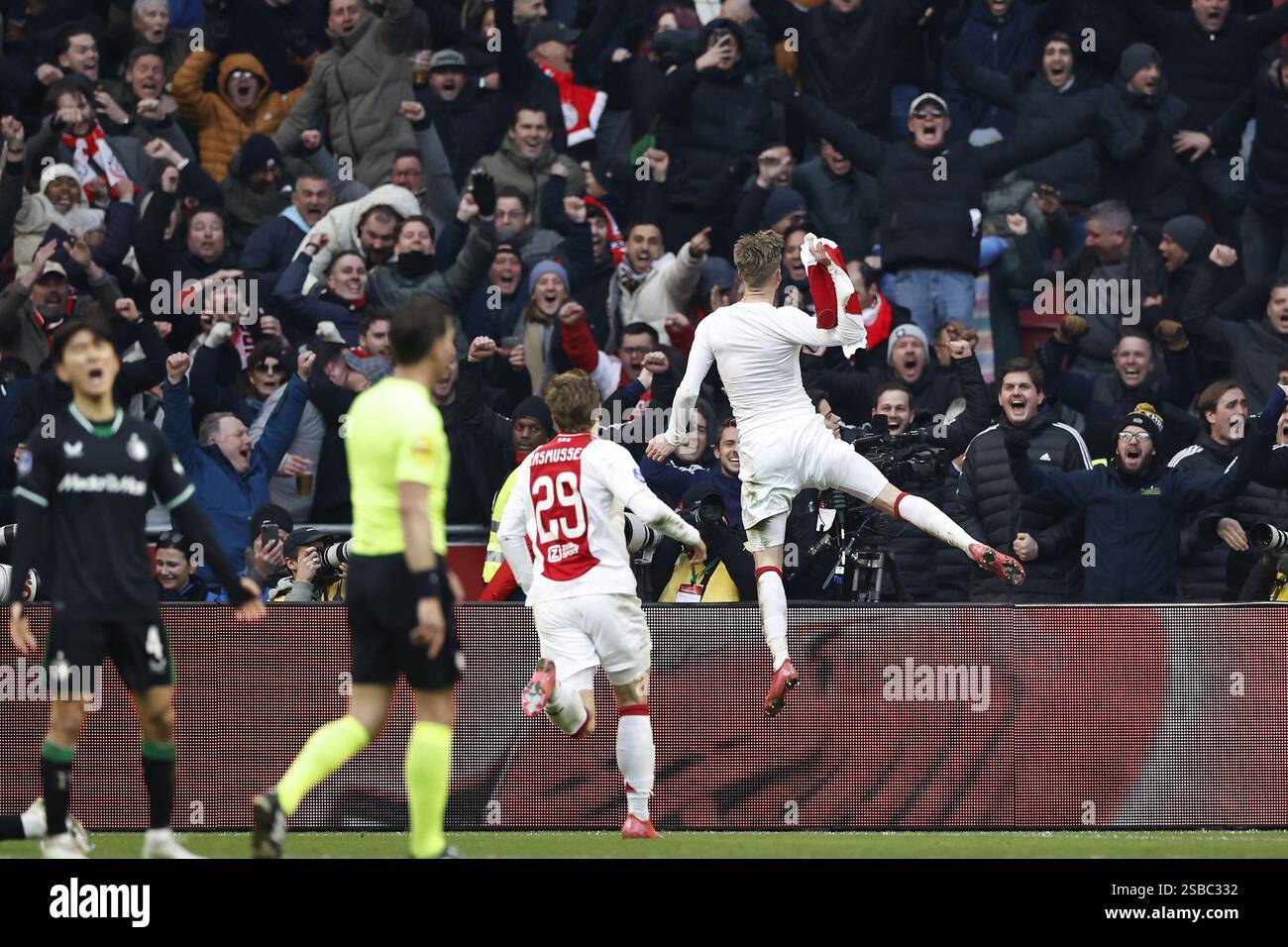 AMSTERDAM - (l-r) Inbeom Hwang of Feyenoord balks, Christian Rasmussen ...