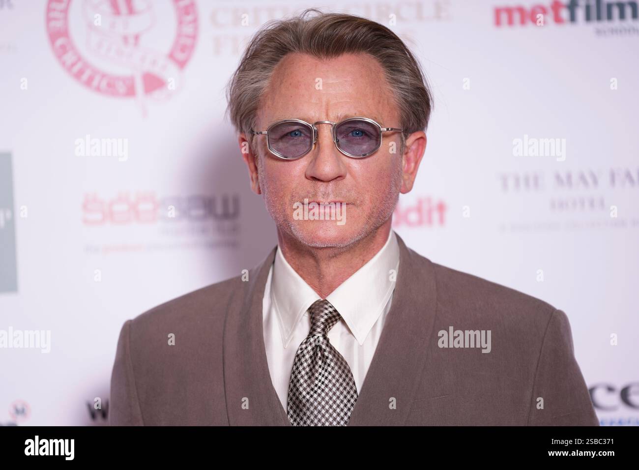 Daniel Craig poses for photographers upon arrival at the 45th London ...