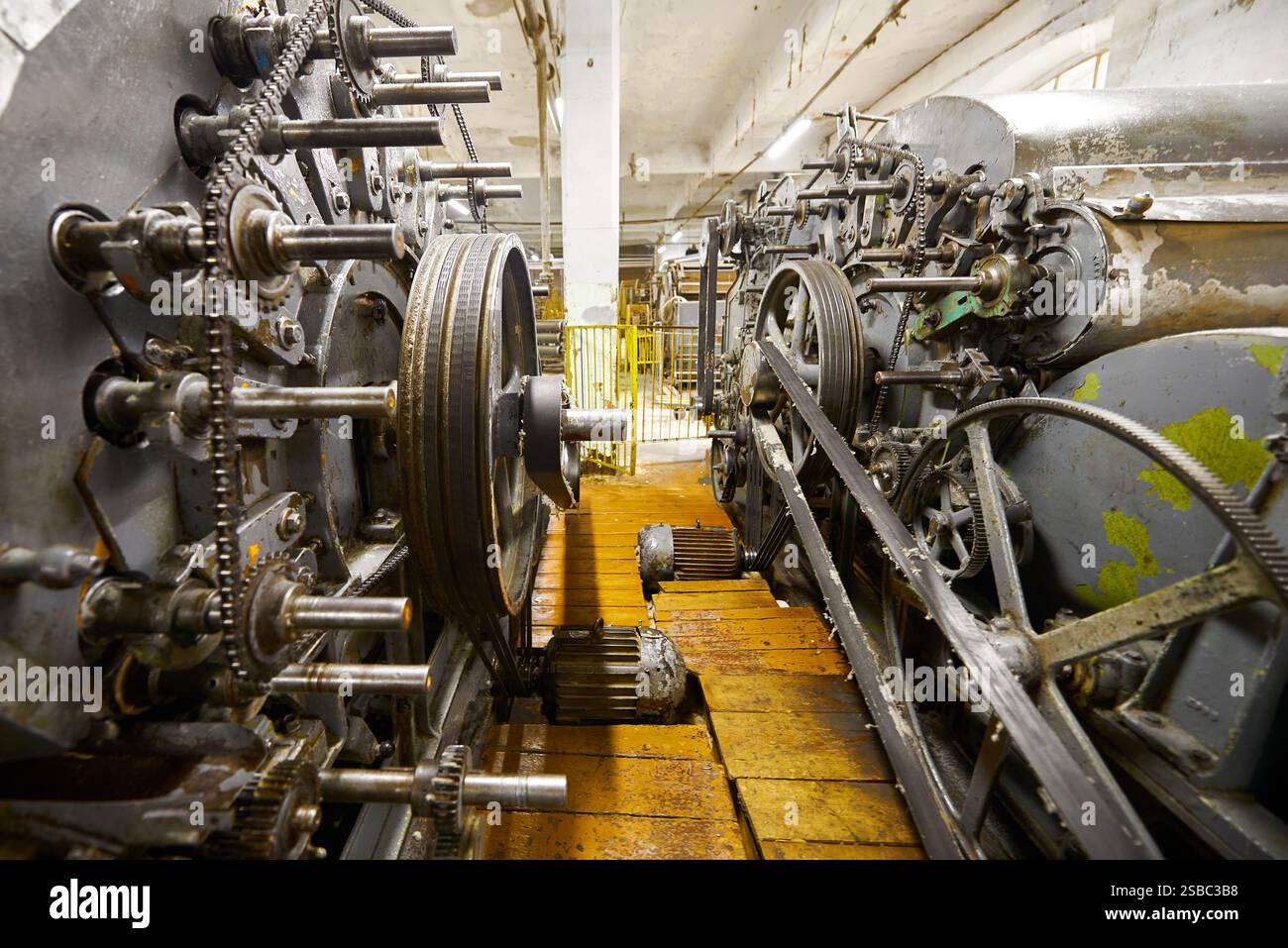 Intricate design of a vintage carding machine showcasing the ...