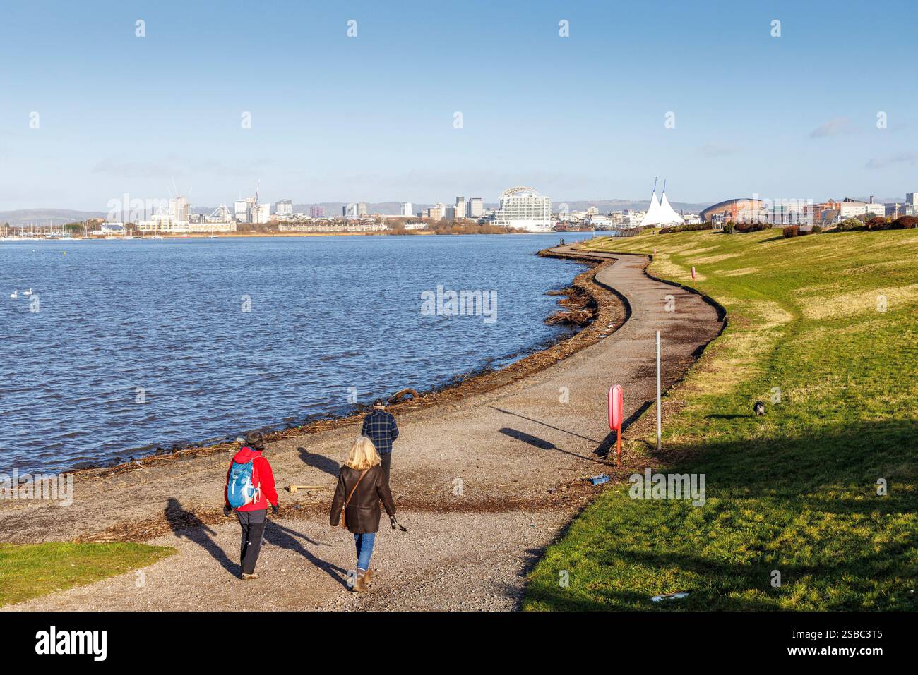 Walking on the footpath around Cardiff Bay, Wales, UK Stock Photo - Alamy