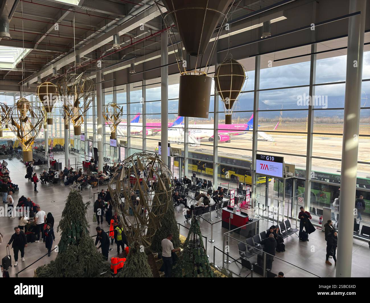 Departure lounge aircraft boarding area inside Tirana International Airport, Mother Theresa ...