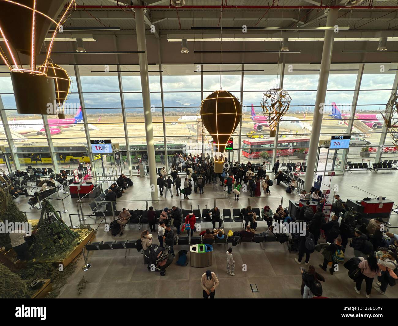 Departure lounge aircraft boarding area inside Tirana International Airport, Mother Theresa ...
