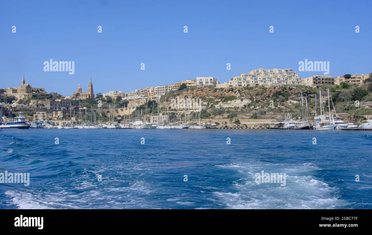 Scenic Waterfront View of a Mediterranean Coastal Town with Clear Blue ...