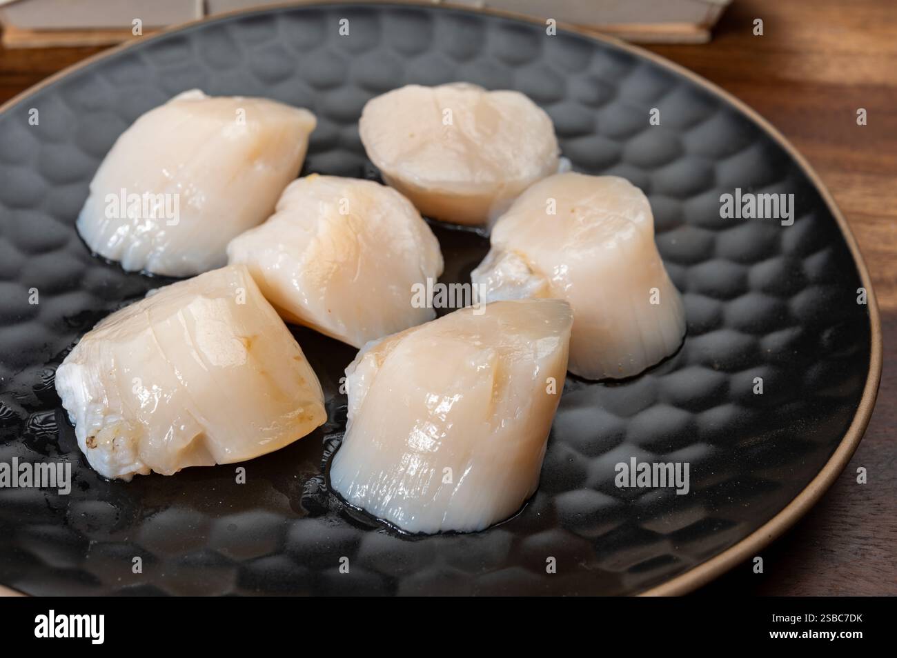 Atlantic bay scallops coquille St. James sea shells, opened in shells ...