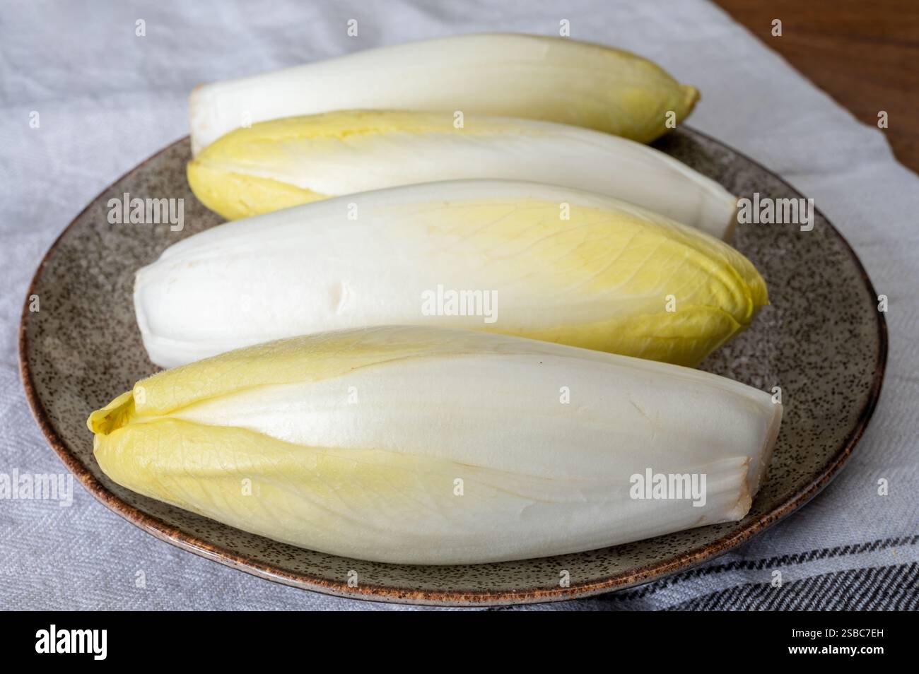 Fresh organic chicory endive salad ready to eat, traditional winter ...