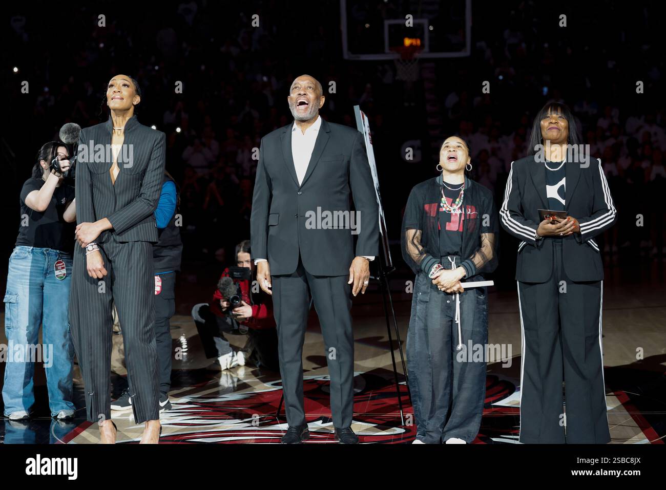 A'ja Wilson, center, stands with her parents, Eva and Roscoe Wilson ...