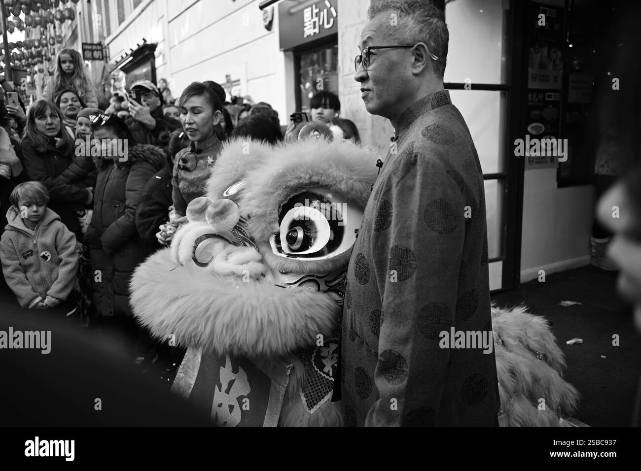 Vibrant Chinese New Year Celebration with Lion Dance in Front of a ...