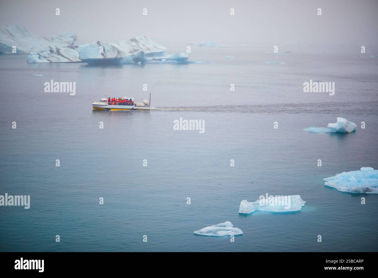 People enjoying amphibian boat tour in Jokulsarlon glacier lagoon in ...