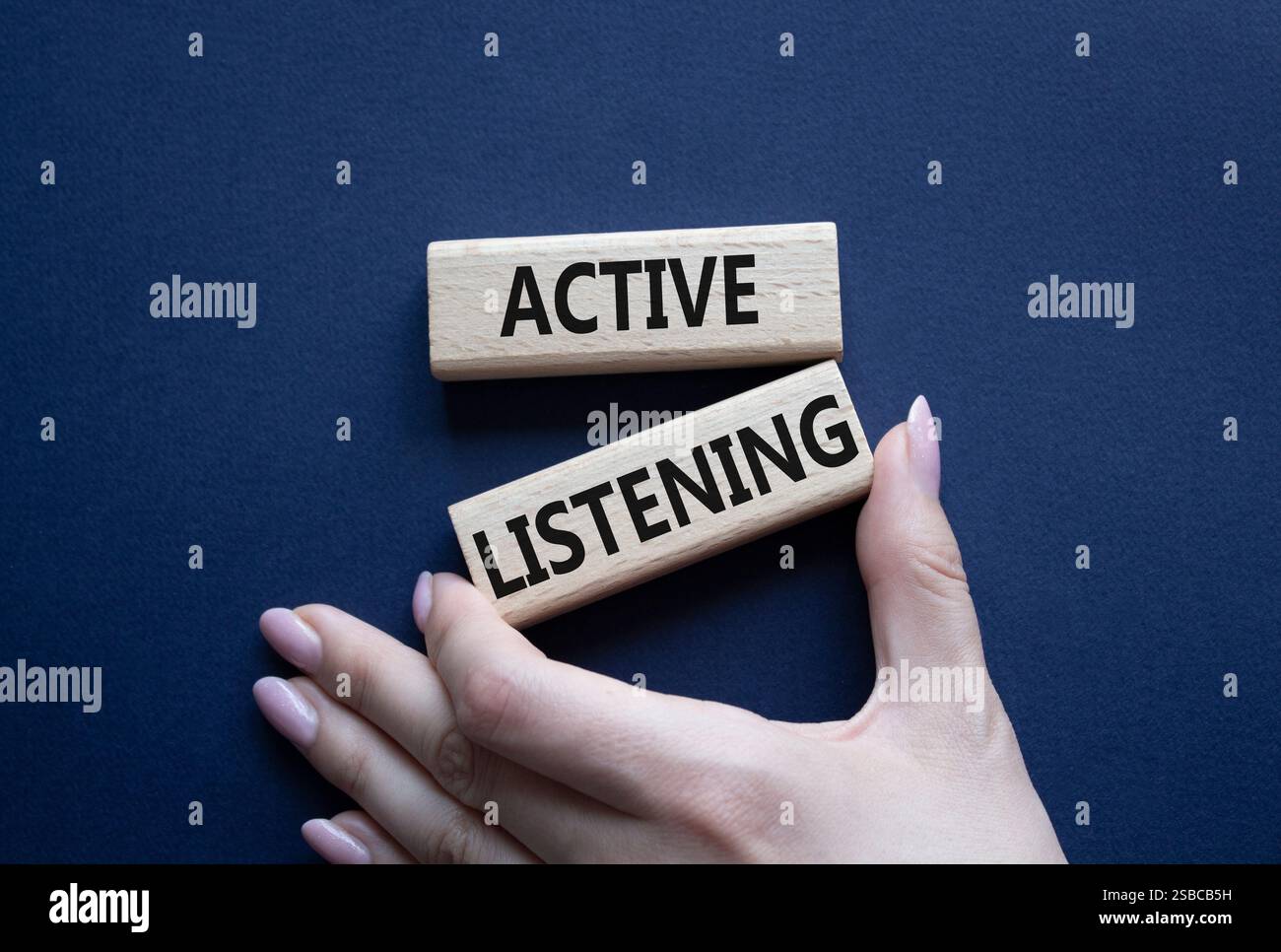 Active listening symbol. Wooden blocks with words Active listening ...