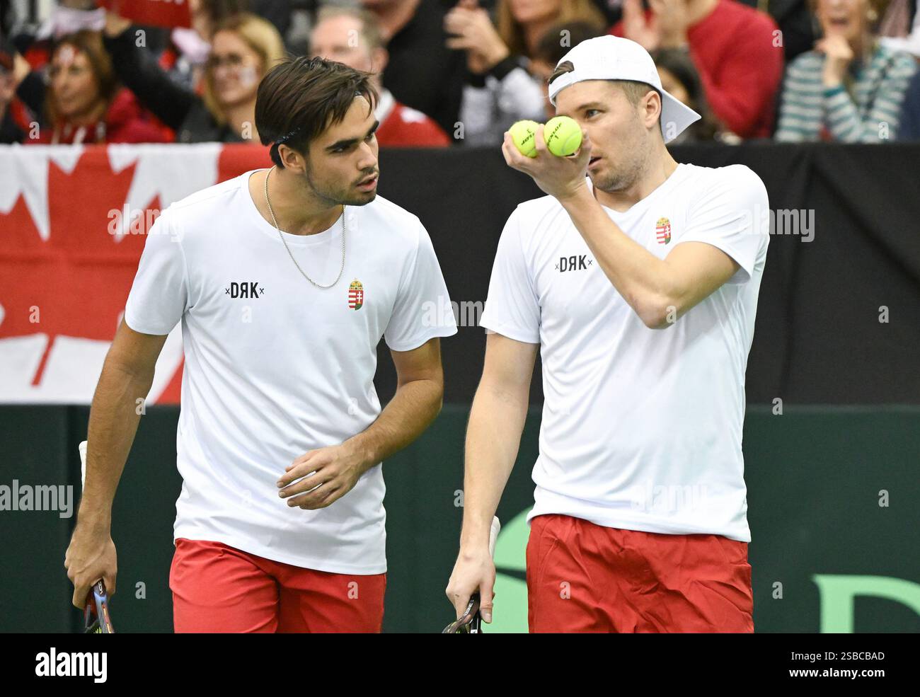 Peter Fajta, left, and Mate Valkusz, of Hungary, talk during their ...