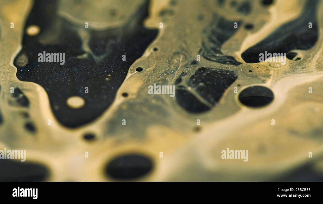 Liquid gel. Blur serum emulsion. Defocused yellow black color shiny ...