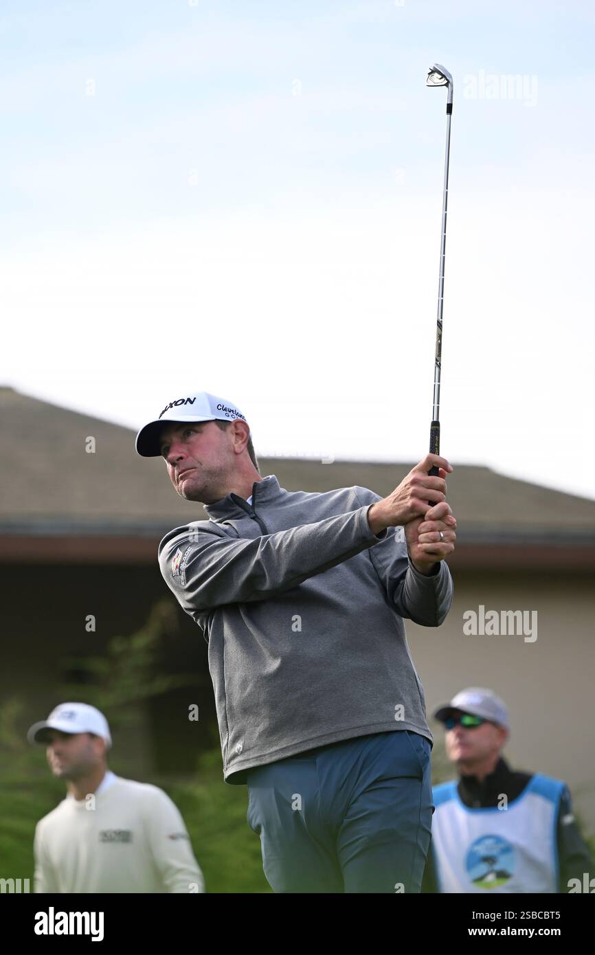Lucas Glover hits from the first tee at Pebble Beach Golf Links during ...