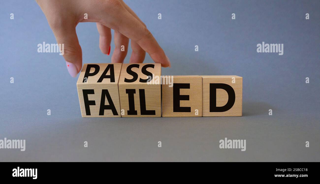 Passed and Failed symbol. Businessman hand turnes wooden cubes and ...