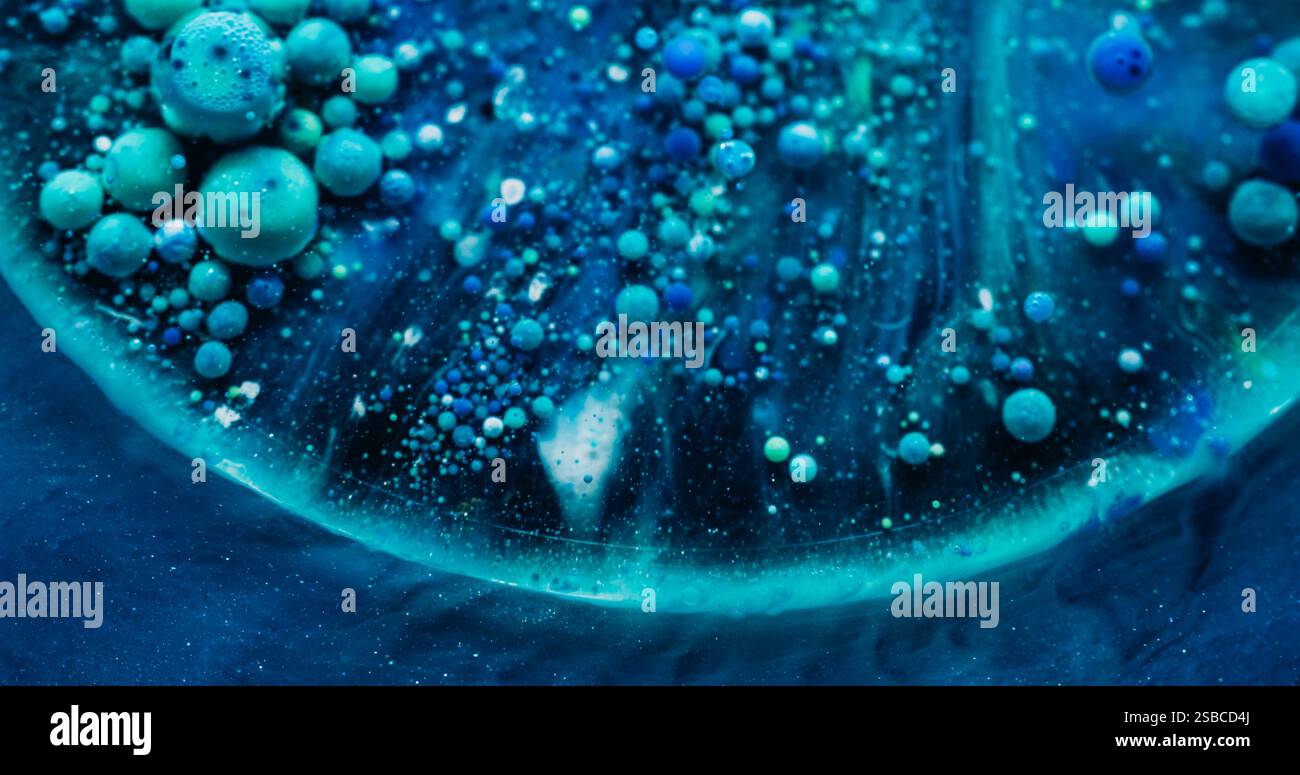 Oil drop paint. Colorful fluid. Art flow layers bubbles dye small ...