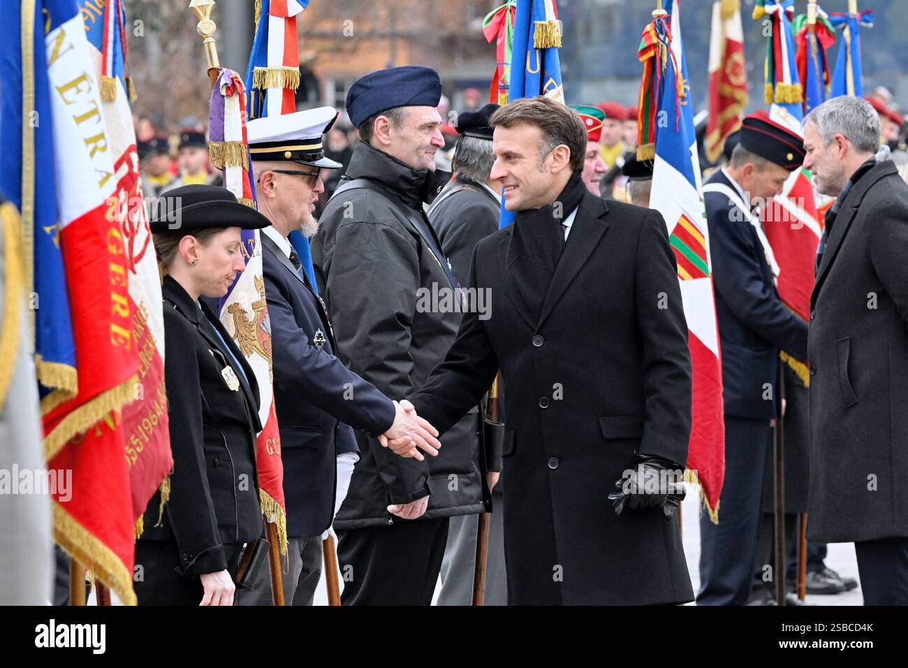 French President Emmanuel Macron presides over the ceremony marking the ...