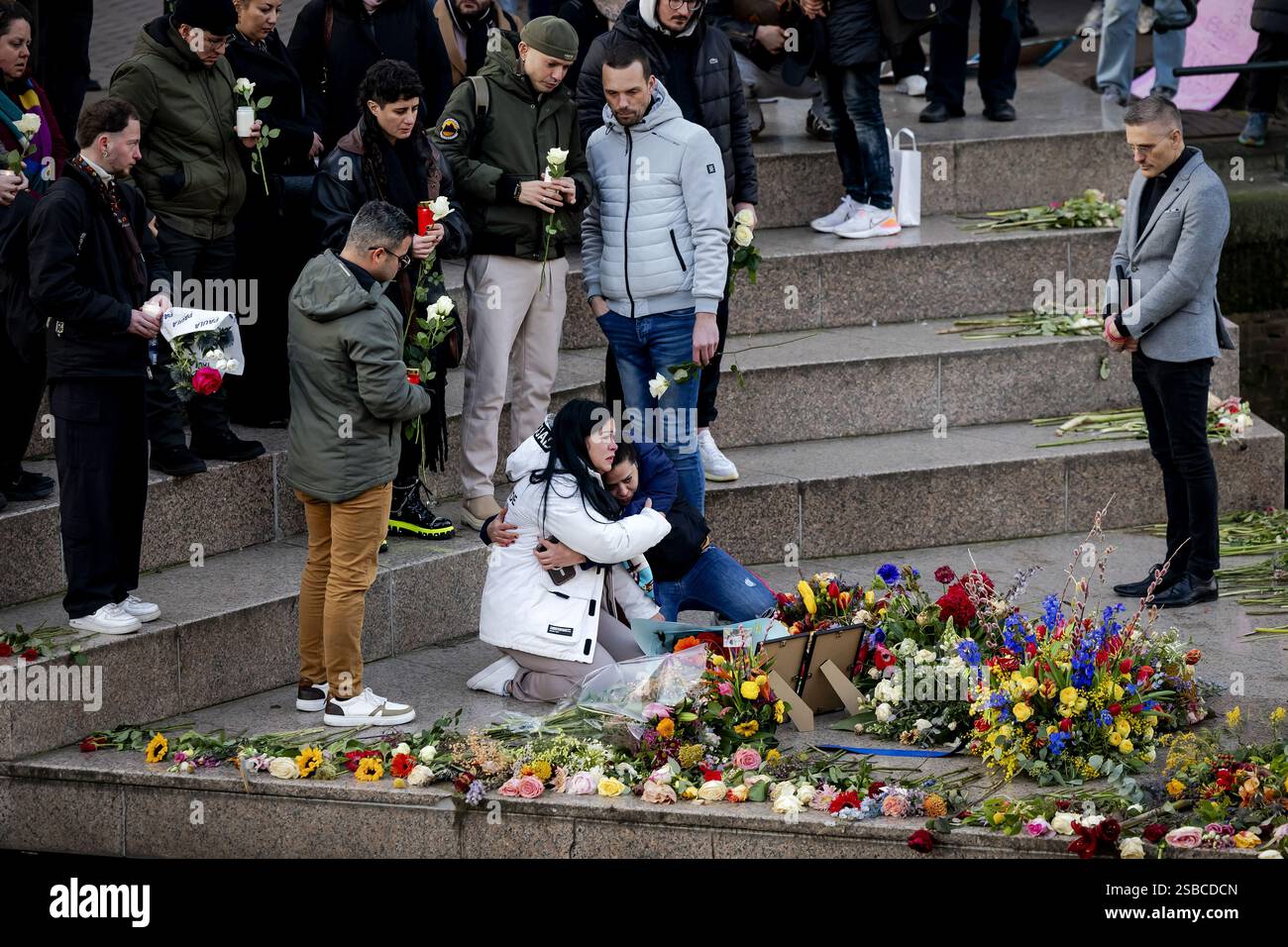 AMSTERDAM - Relatives and friends during a memorial at the Gay Monument ...