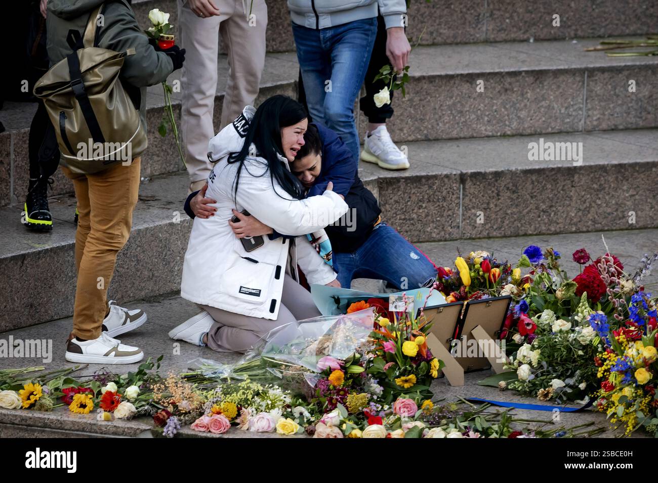 AMSTERDAM - Relatives and friends during a memorial at the Gay Monument ...
