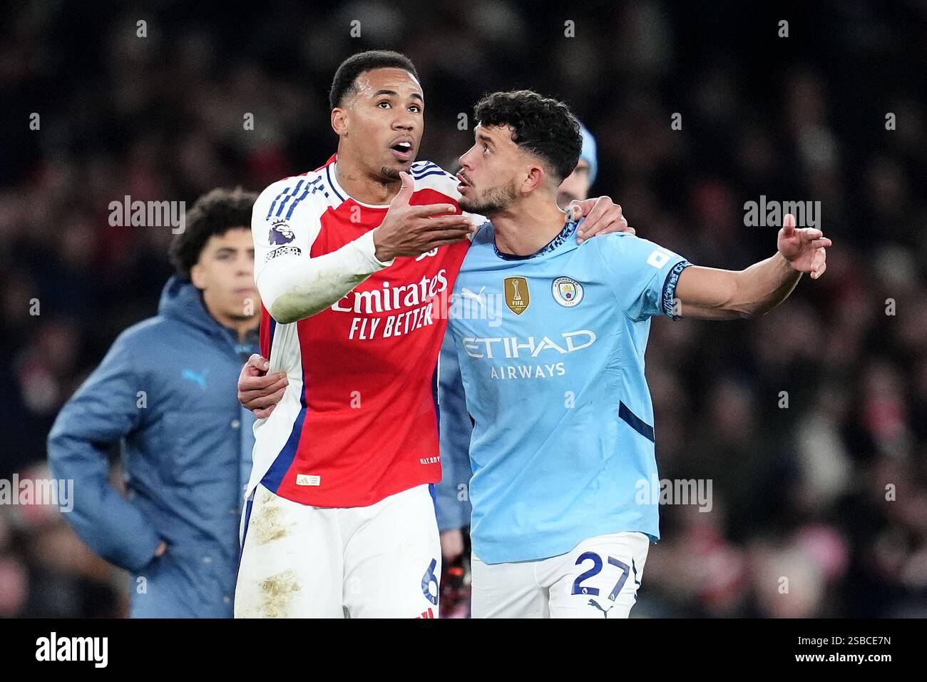 Tempers flare between Arsenal's Gabriel (left) and Manchester City's ...