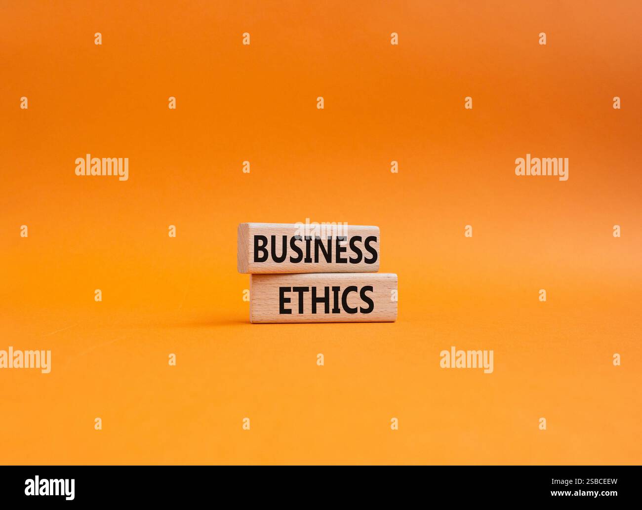 Business ethics symbol. Concept word Business ethics on wooden blocks ...