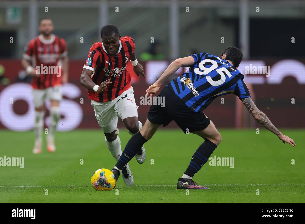 Milan, Italy. 2nd Feb, 2025. Yunus Musah of AC Milan takes on Alessandro Bastoni of FC ...