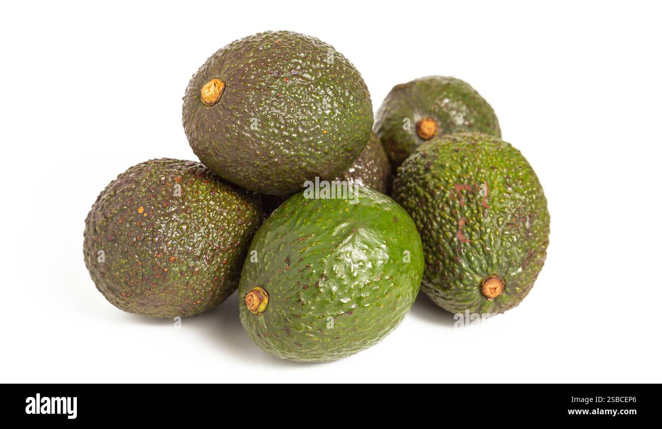 Close-up of green avocados on white background Stock Photo - Alamy
