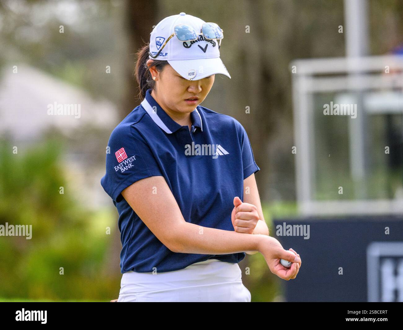 Orlando, FL, USA. 2nd Feb, 2025. Rose Zang massages her right forearm ...