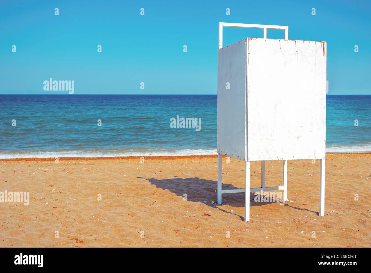 Beach changing room or dressing booth at Aegean sea shoreline in summer ...