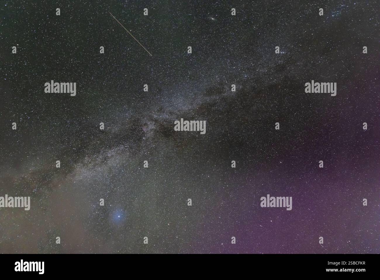 Mesmerizing view of the Milky Way galaxy stretches across the night sky ...