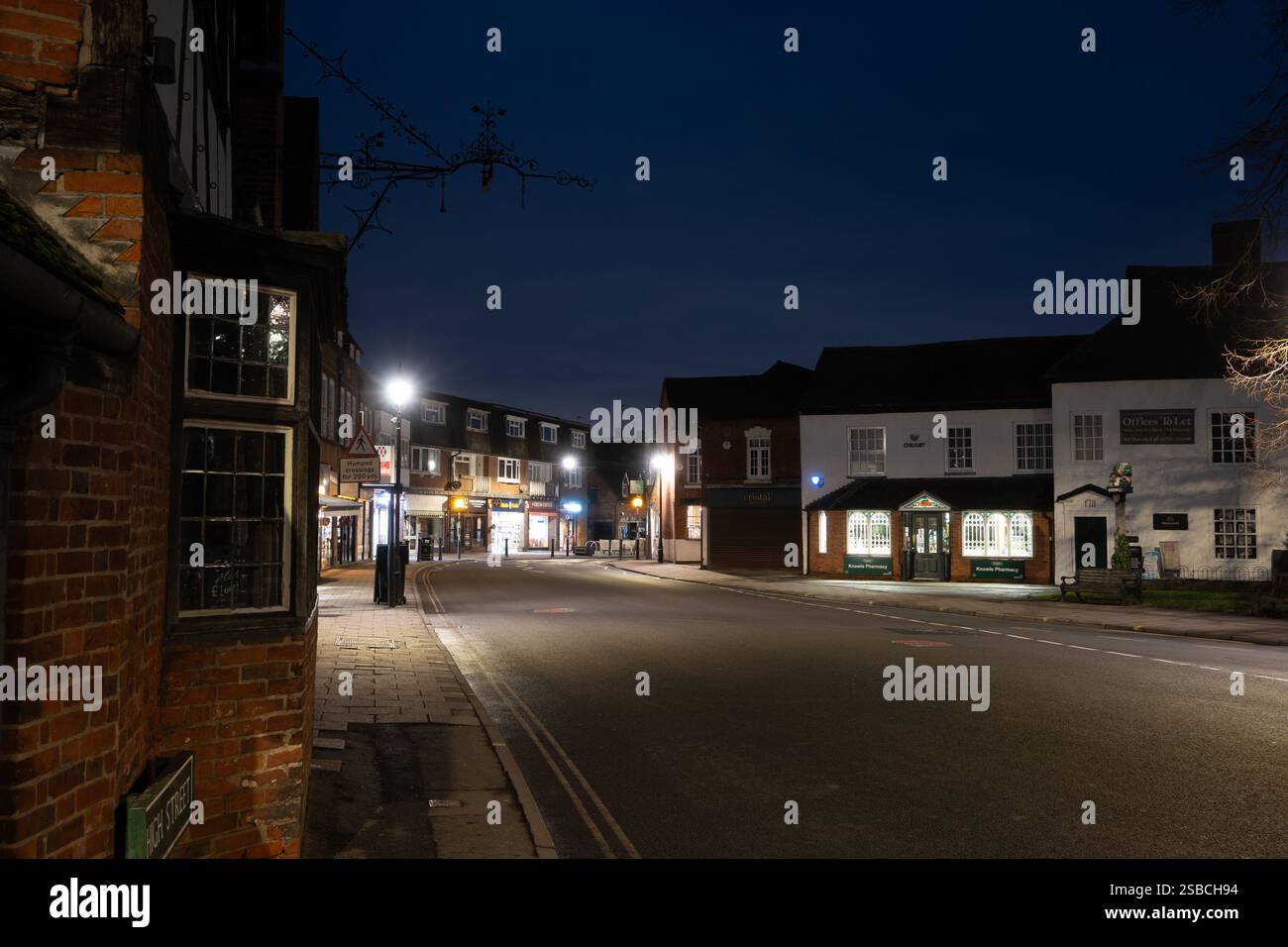 High Street at night, Knowle, West Midlands, England, UK Stock Photo ...