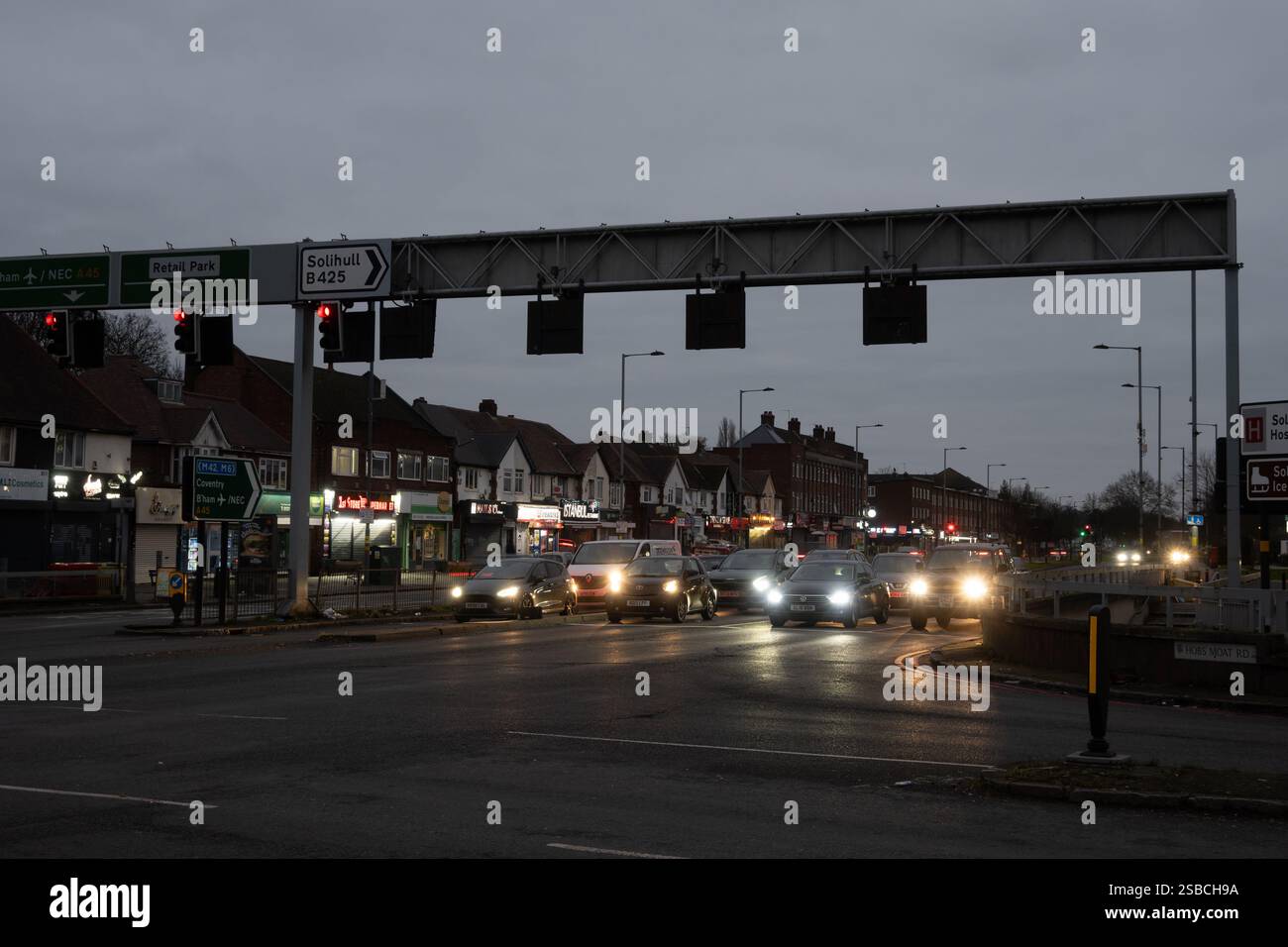 Cars on the A45 road at traffic lights, early morning, Sheldon, West ...