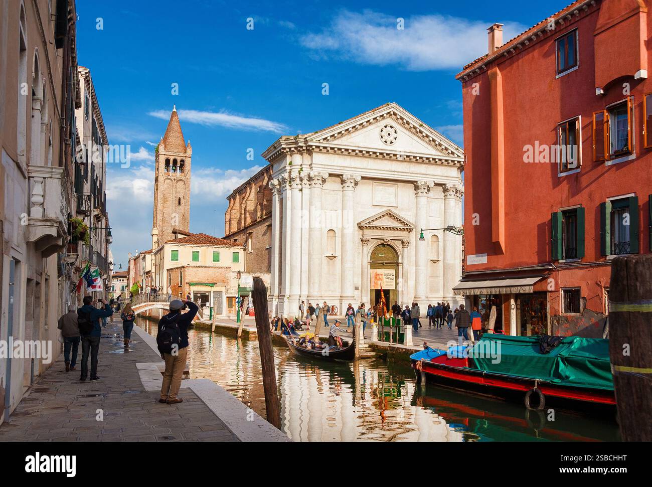 Tourism in Venice. View of Rio San Barnaba canal with gondolas, old ...