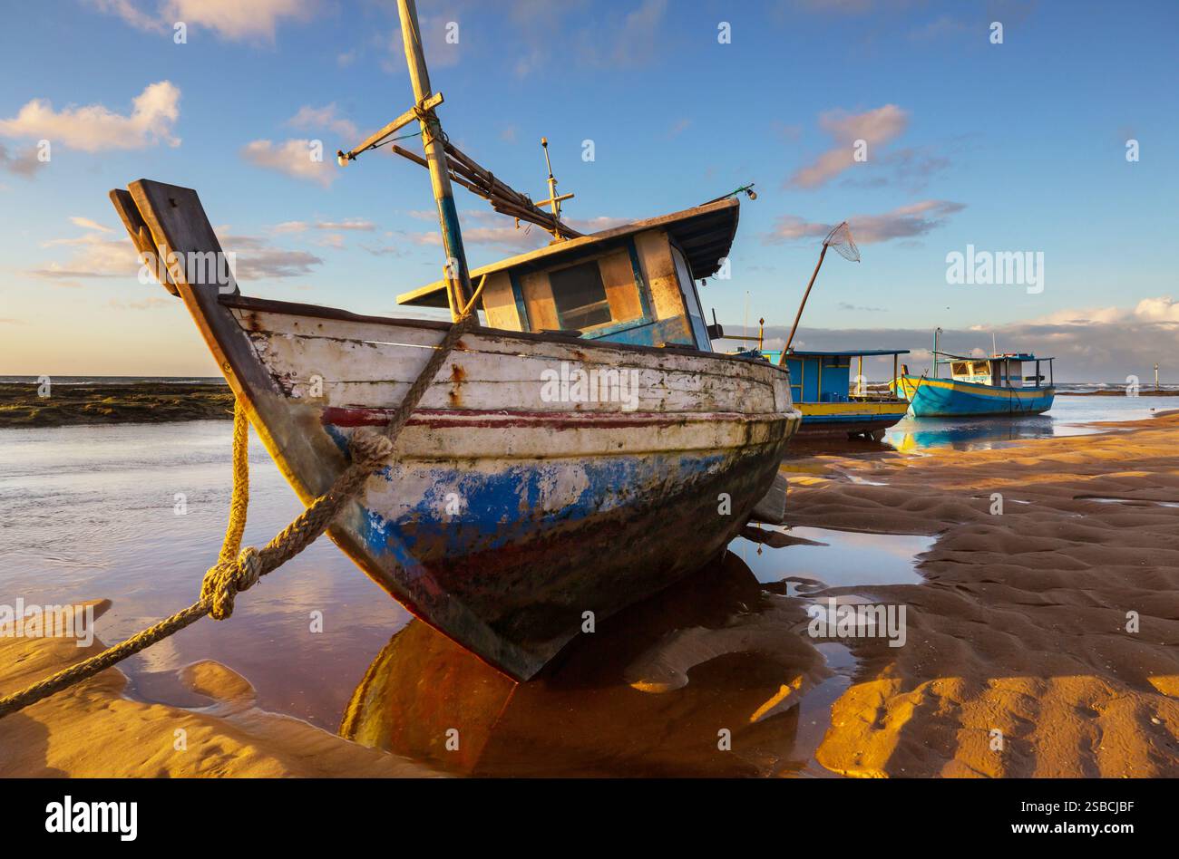 The fishing boats on ocean beach in Brazil, South America Stock Photo ...