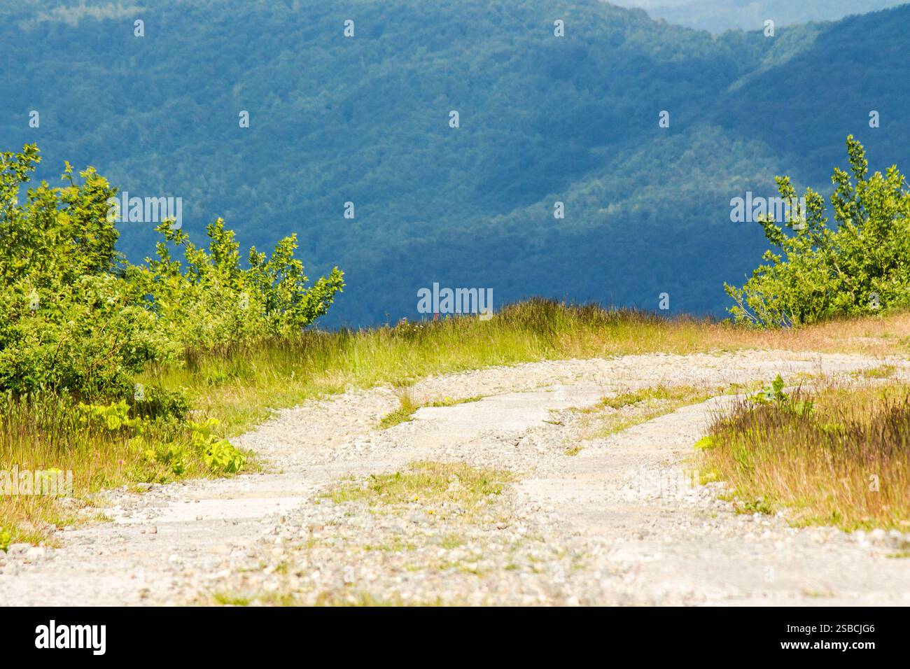 old concrete mountain road. vacation season. path through smooth mount ...