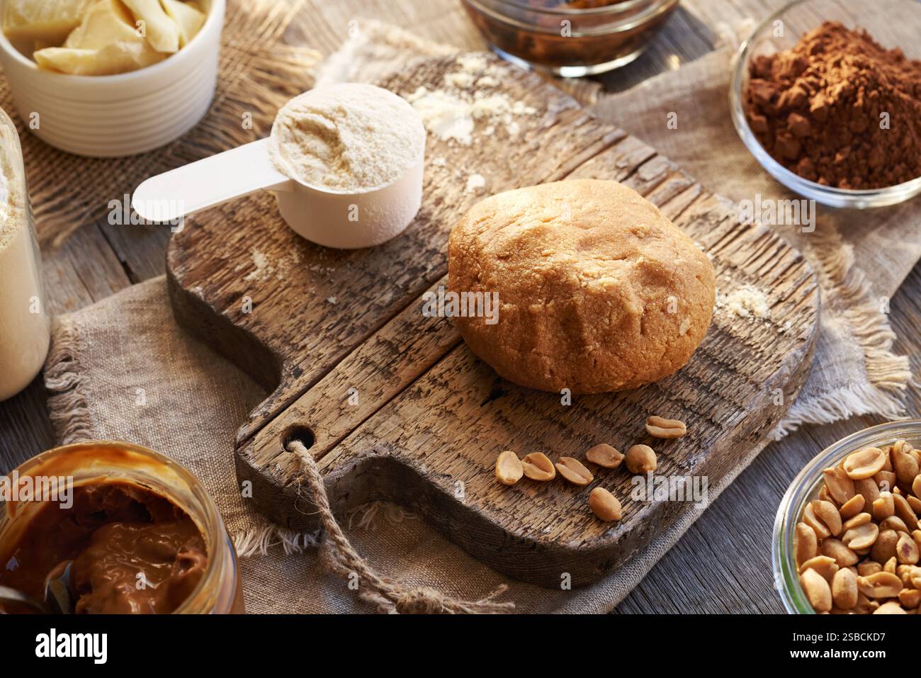 Dough made of whey protein powder, peanut butter and maple syrup ...