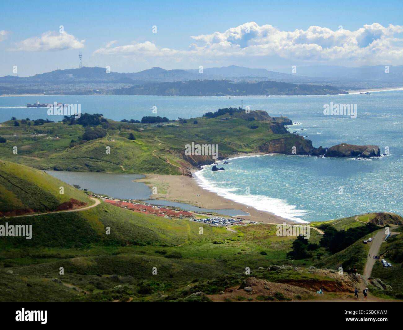Green hills of Marin Headlands and Rodeo Beach view from above, part of ...