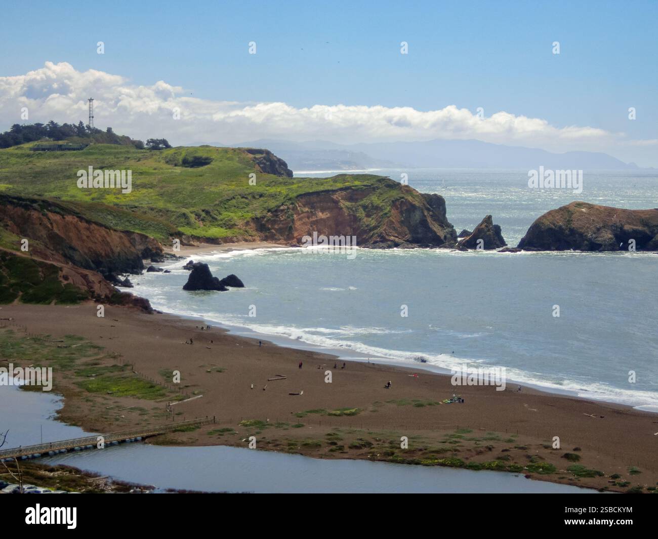 View from above of Rodeo Beach and rocky shoreline in Marin Headlands ...