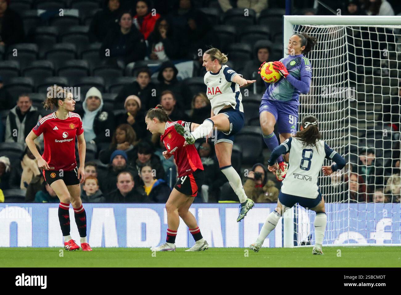 Phallon Tullis-Joyce of Manchester United Women makes a save during the ...