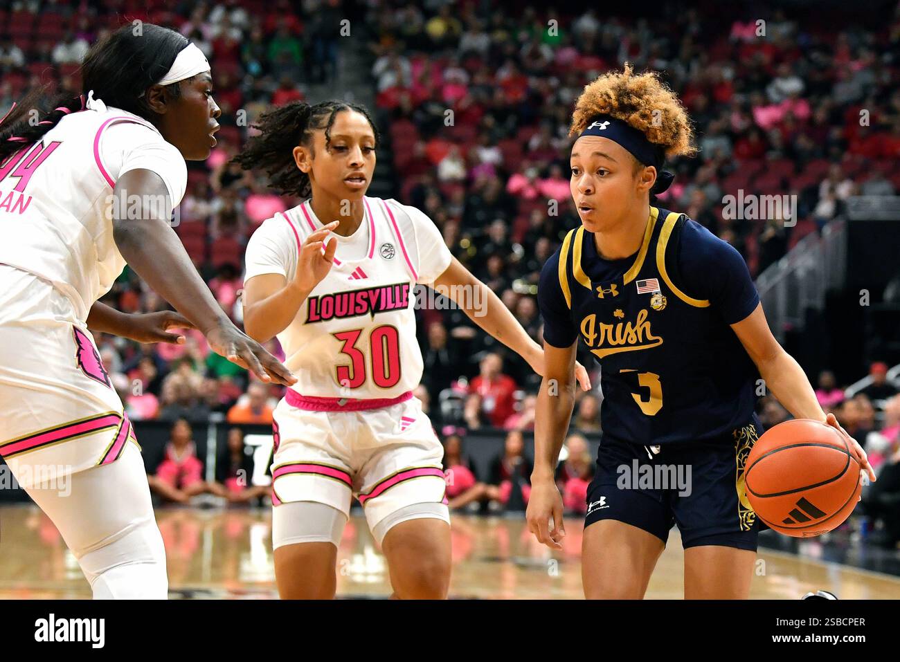 Notre Dame guard Hannah Hidalgo (3) drives to the basket against Louisville forward Olivia ...