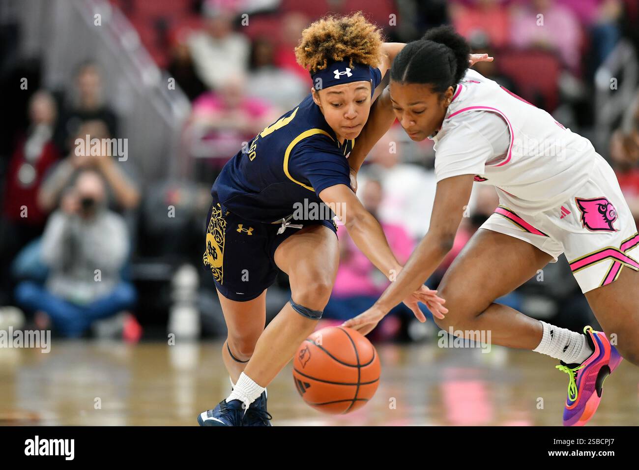 Notre Dame guard Hannah Hidalgo, left, and Louisville guard Izela ...
