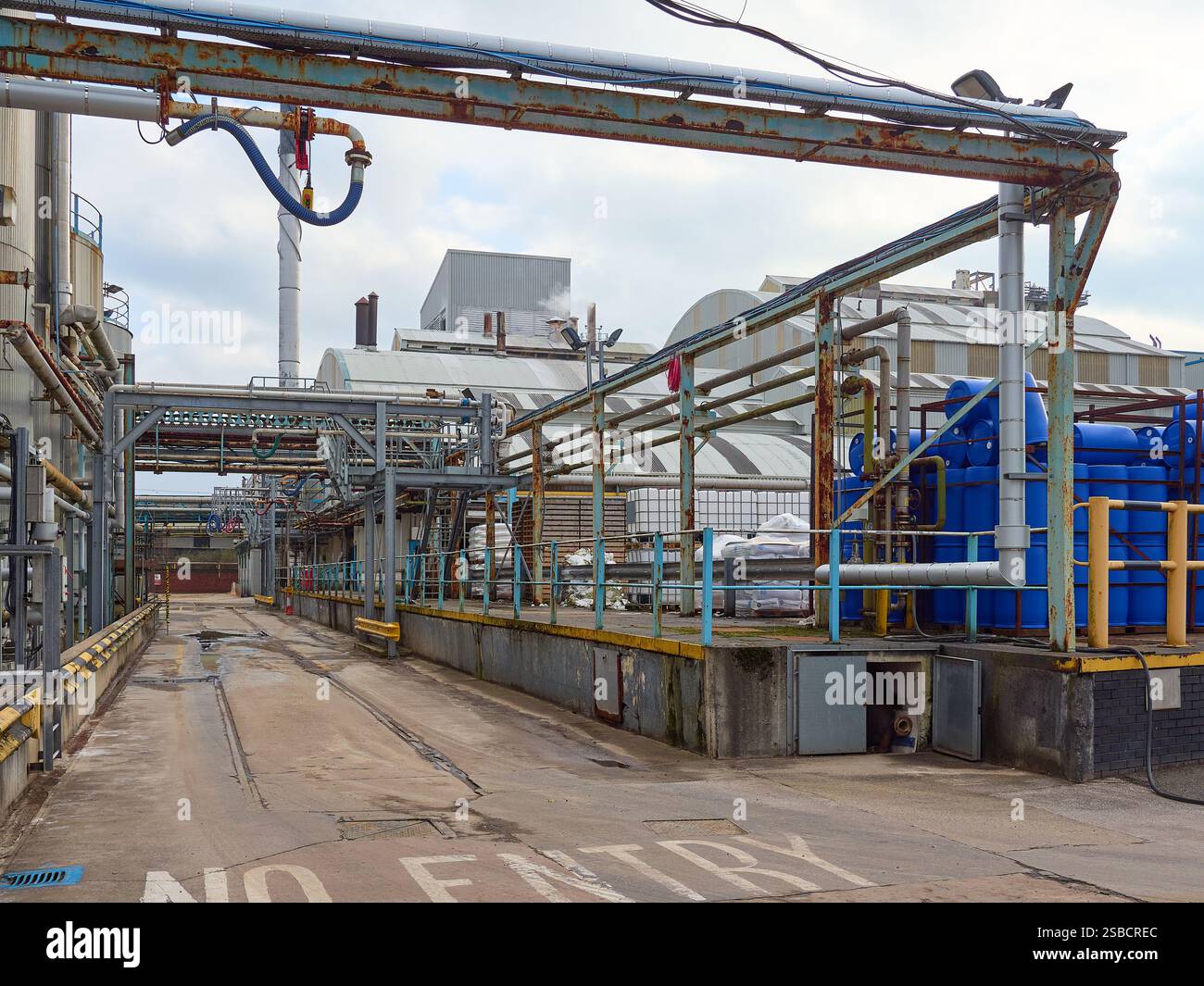 Industrial chemical factory with complex metal piping infrastructure ...