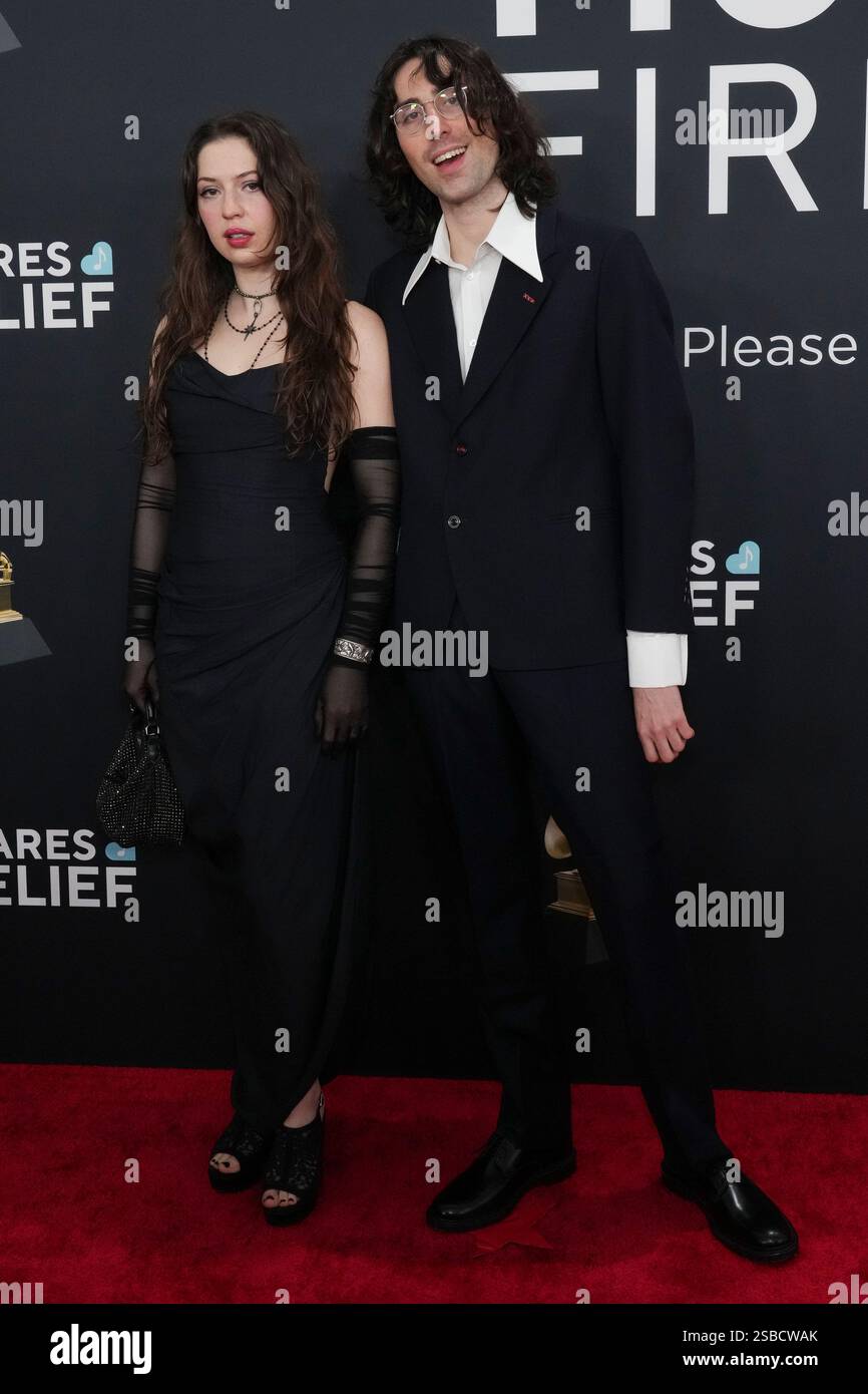 Alaska Reid, left, and A.G. Cook arrive at the 67th annual Grammy ...