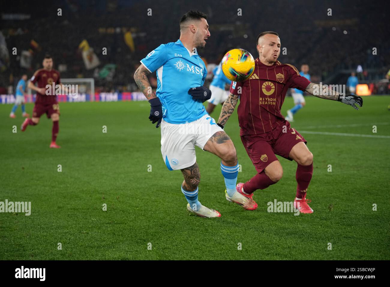 Napoli's Matteo Politano, centre, and Roma's Angelino challenge for the ...