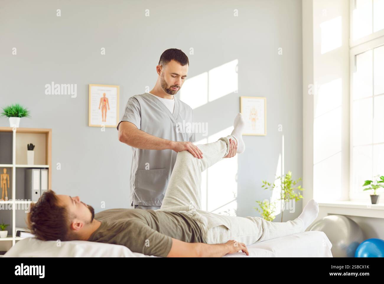 Physiotherapist providing physical therapy and healing treatment for ...