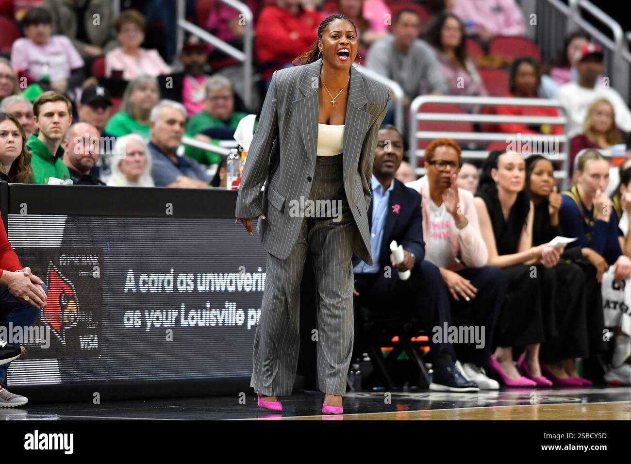 Notre Dame head coach Niele Ivey, center, shouts instructions to her ...