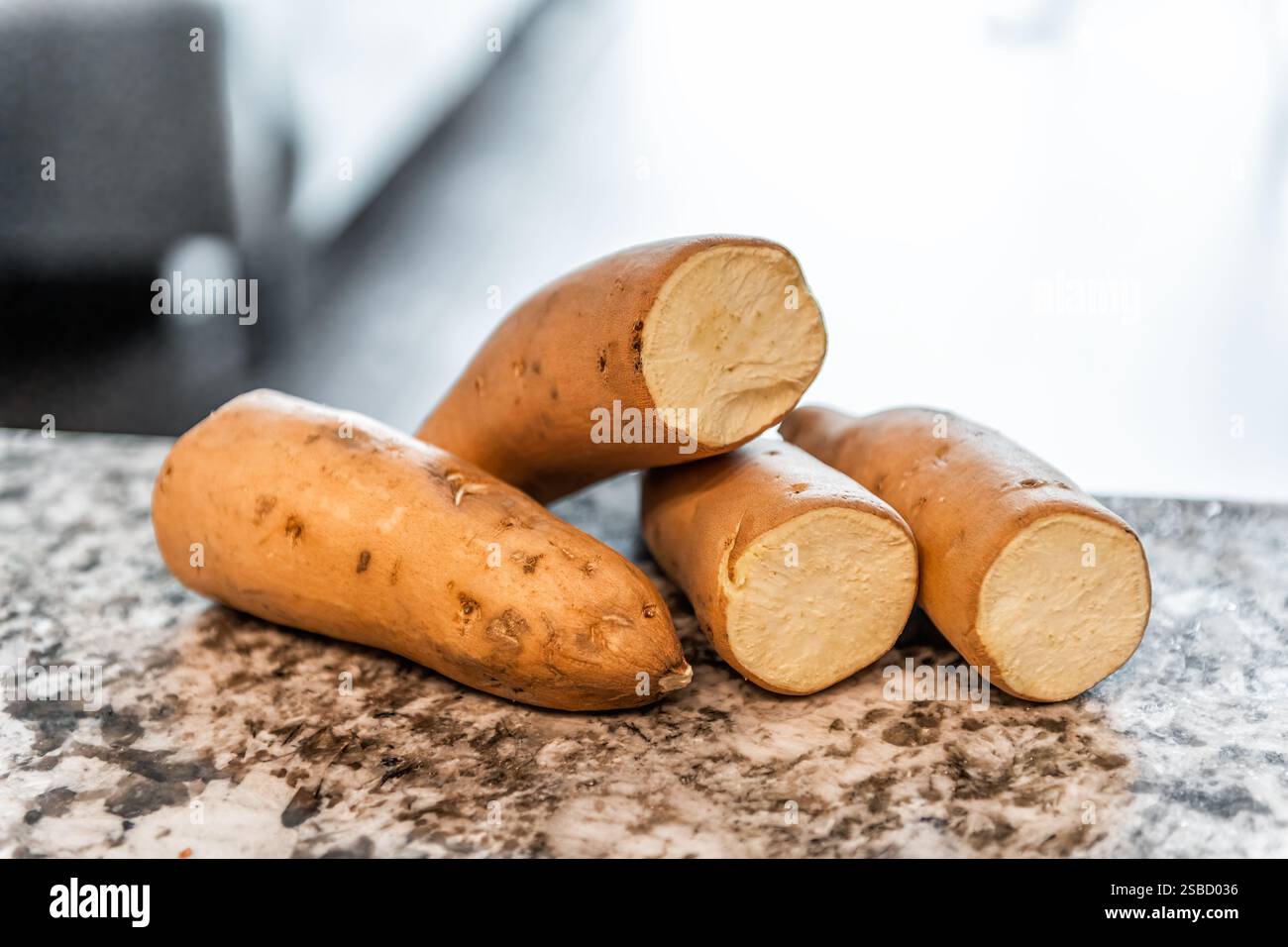 Table with closeup of raw vegetables uncooked tan colored Hannah sweet ...