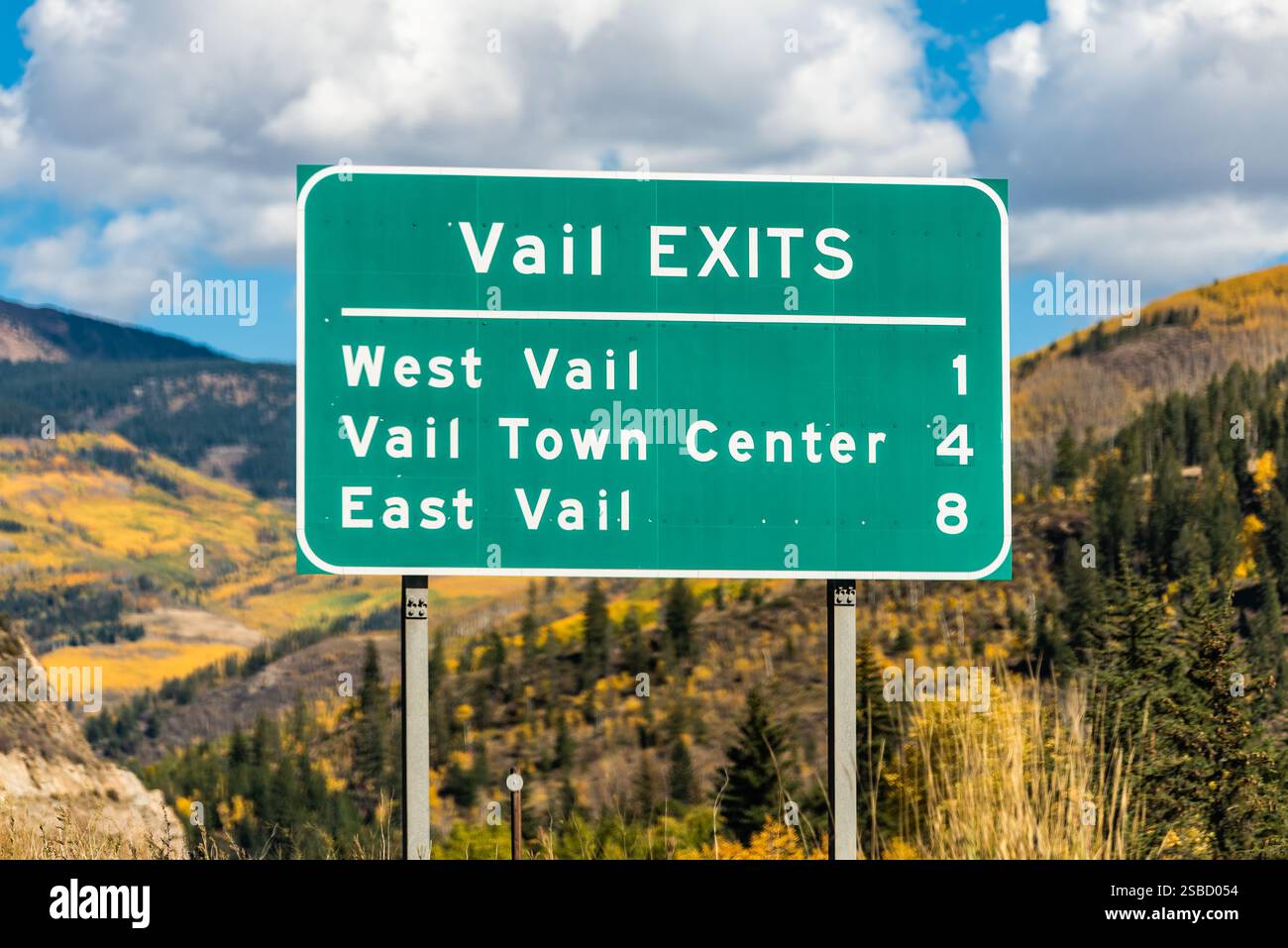 Vail exit signpost on road highway in Colorado towns in rocky mountains ...