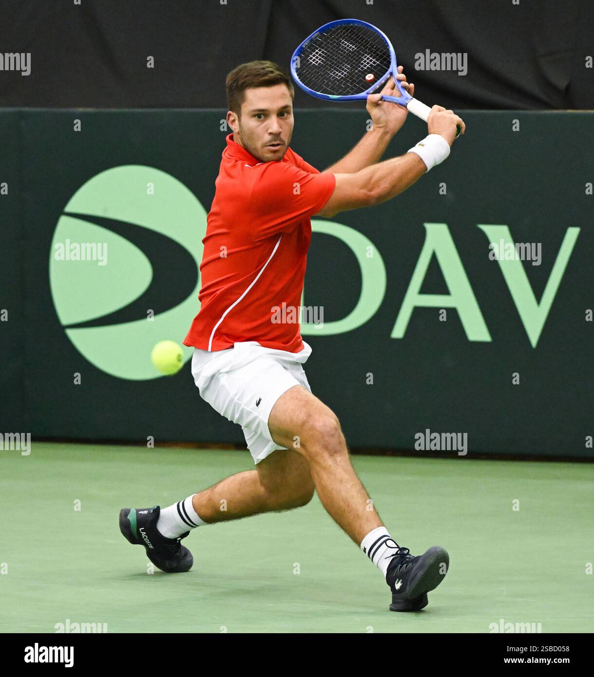 Alexis Galarneau, of Canada, plays a shot to Marton Fucsovics, of ...