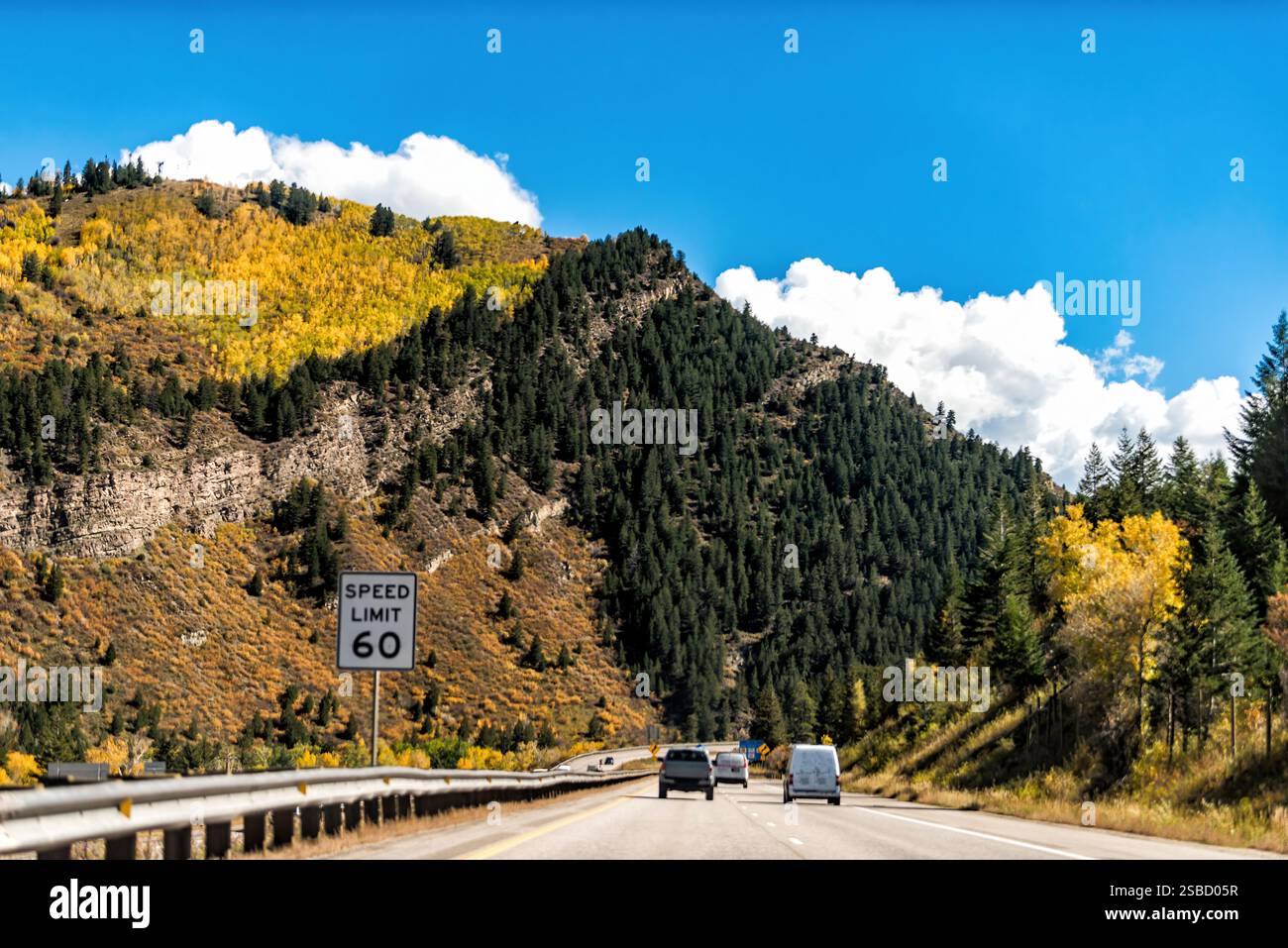 Road highway through Colorado towns to Vail in rocky mountains with ...